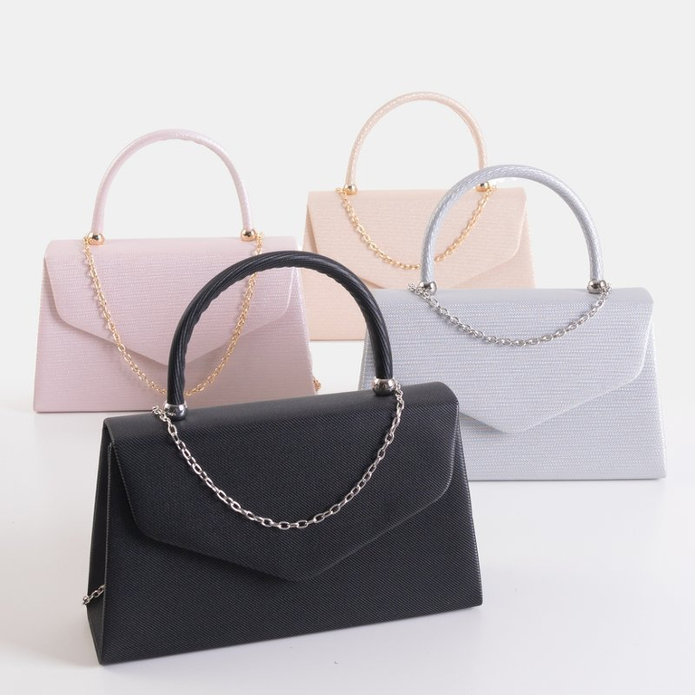 Elegante rosa Handtasche an einer Kette - Handtaschen - pink ...